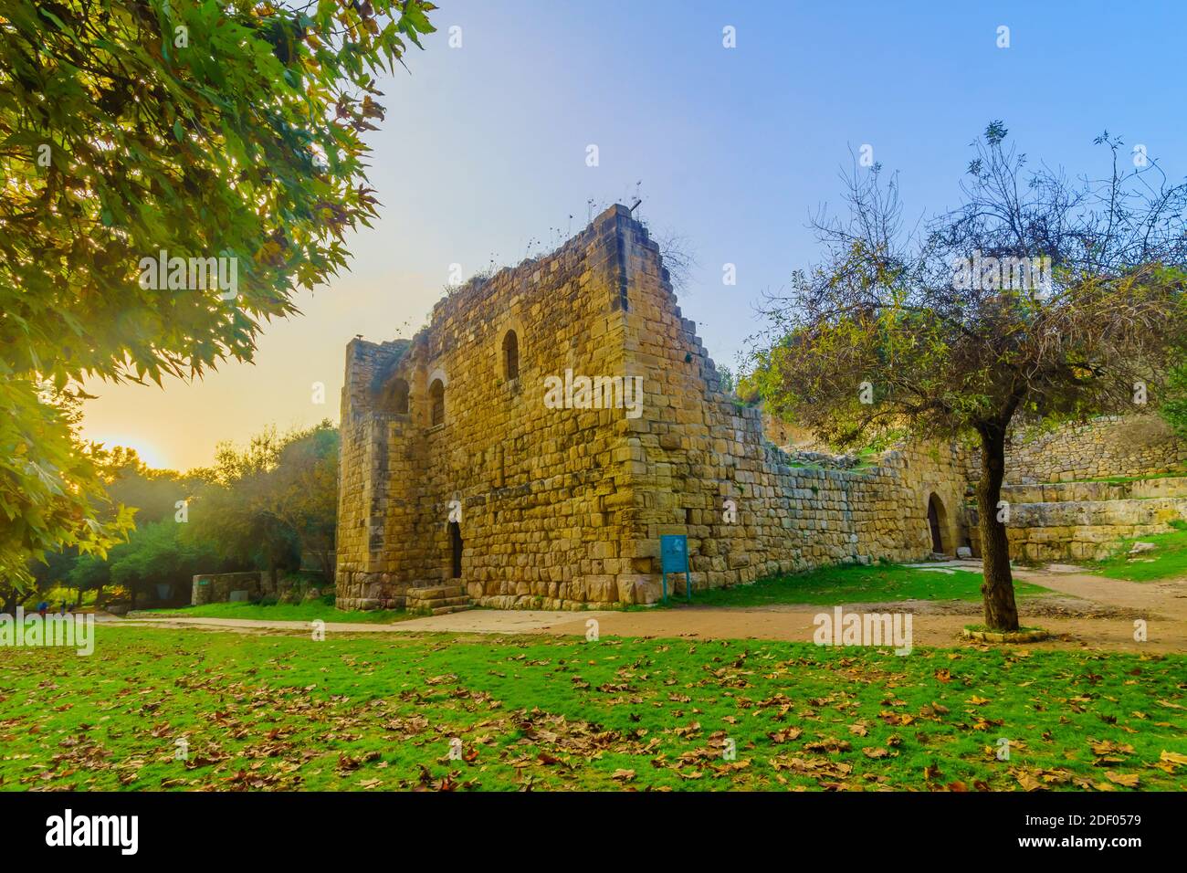 View of a Crusader farmhouse, with trees, and fall foliage in En Hemed ...