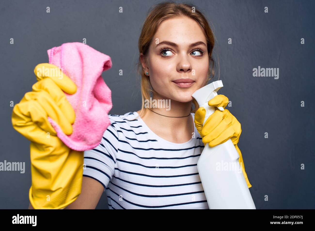 Cleaning lady with detergent rag in hand home care interior service ...