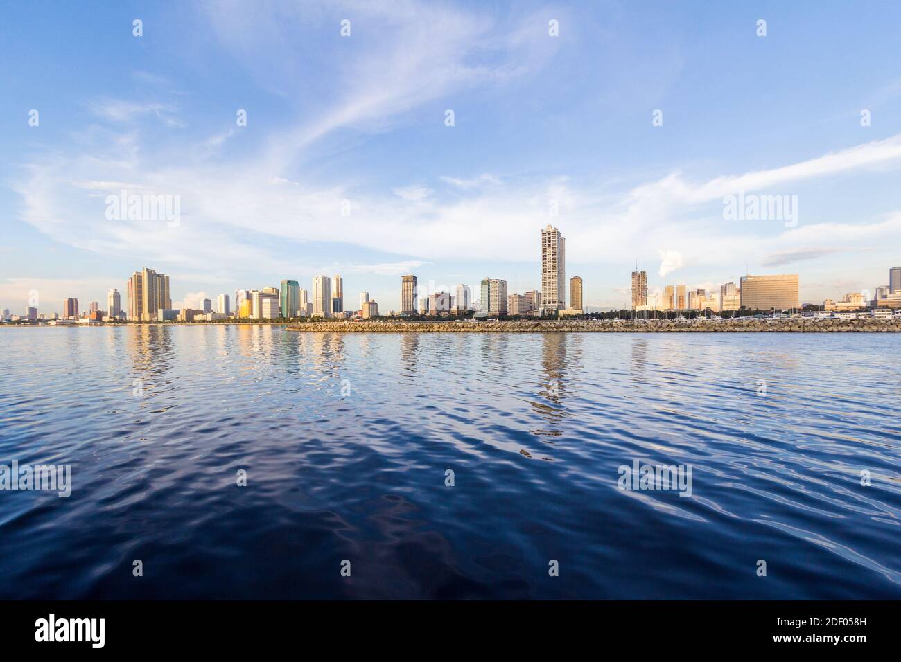 Commercial buildings in Manila as seen from Manila Bay, Philippines ...