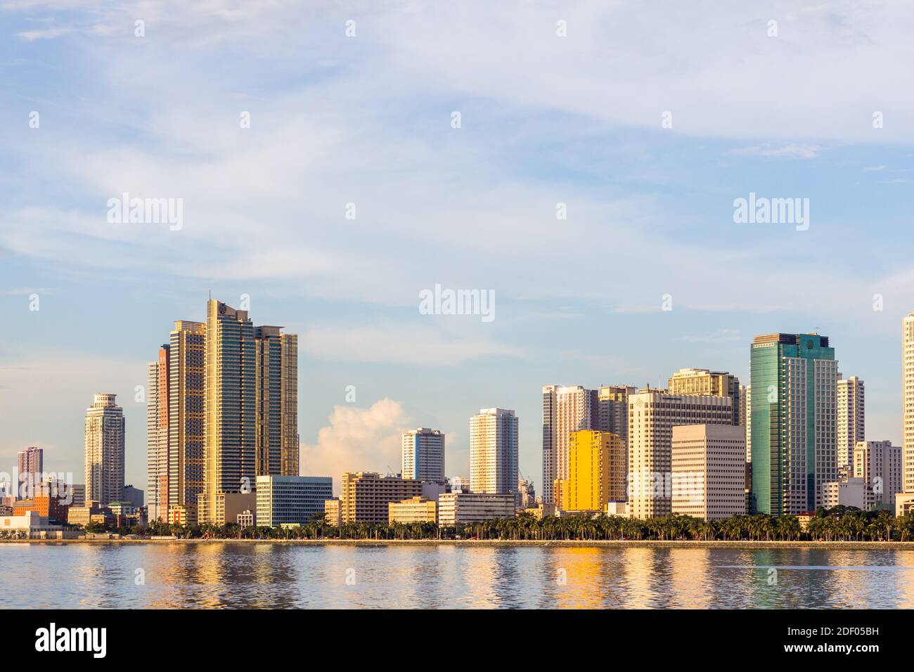 Commercial buildings in Manila as seen from Manila Bay, Philippines ...