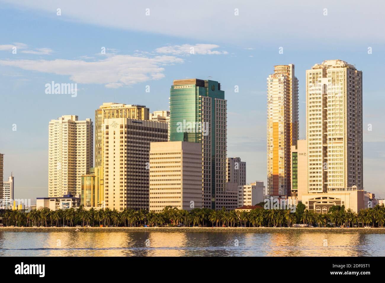 Commercial buildings in Manila as seen from Manila Bay, Philippines ...