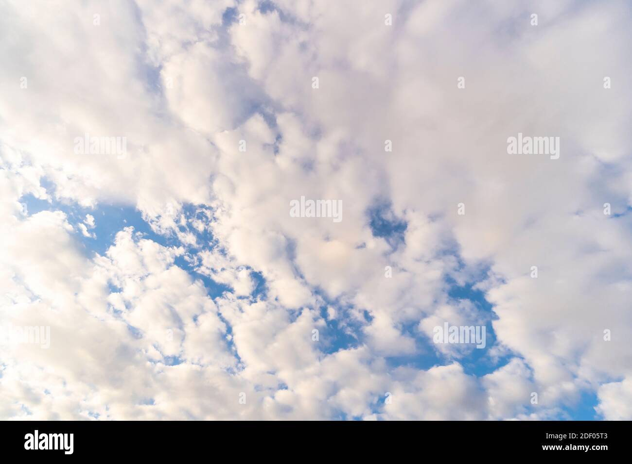 Autumn clouds float on the sky during dusk over the East Village at New ...