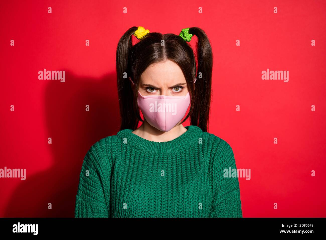 Photo of unhappy angry attractive young woman wear mask protection ...