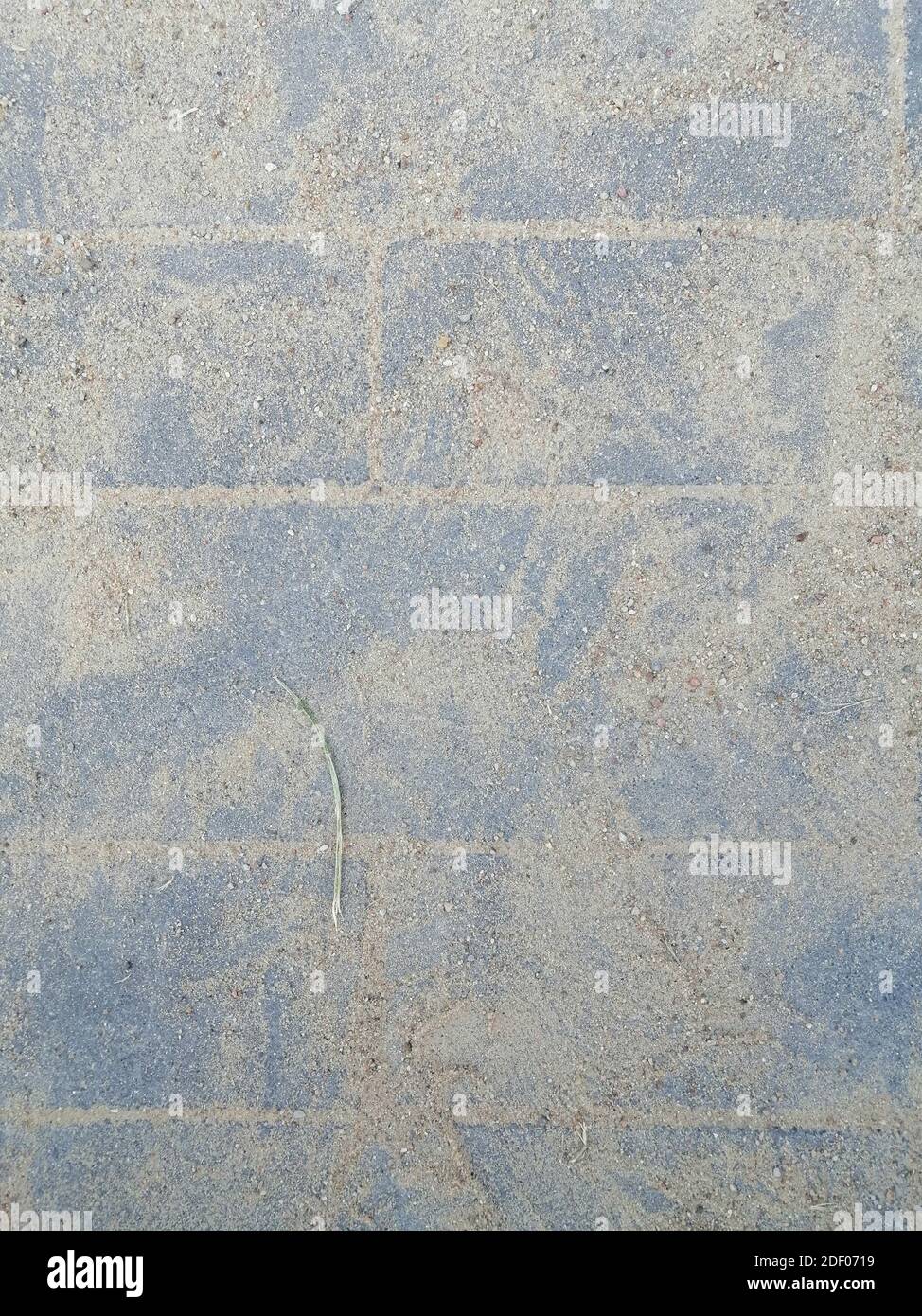A vertical shot of sandy paving slab with gray texture Stock Photo - Alamy