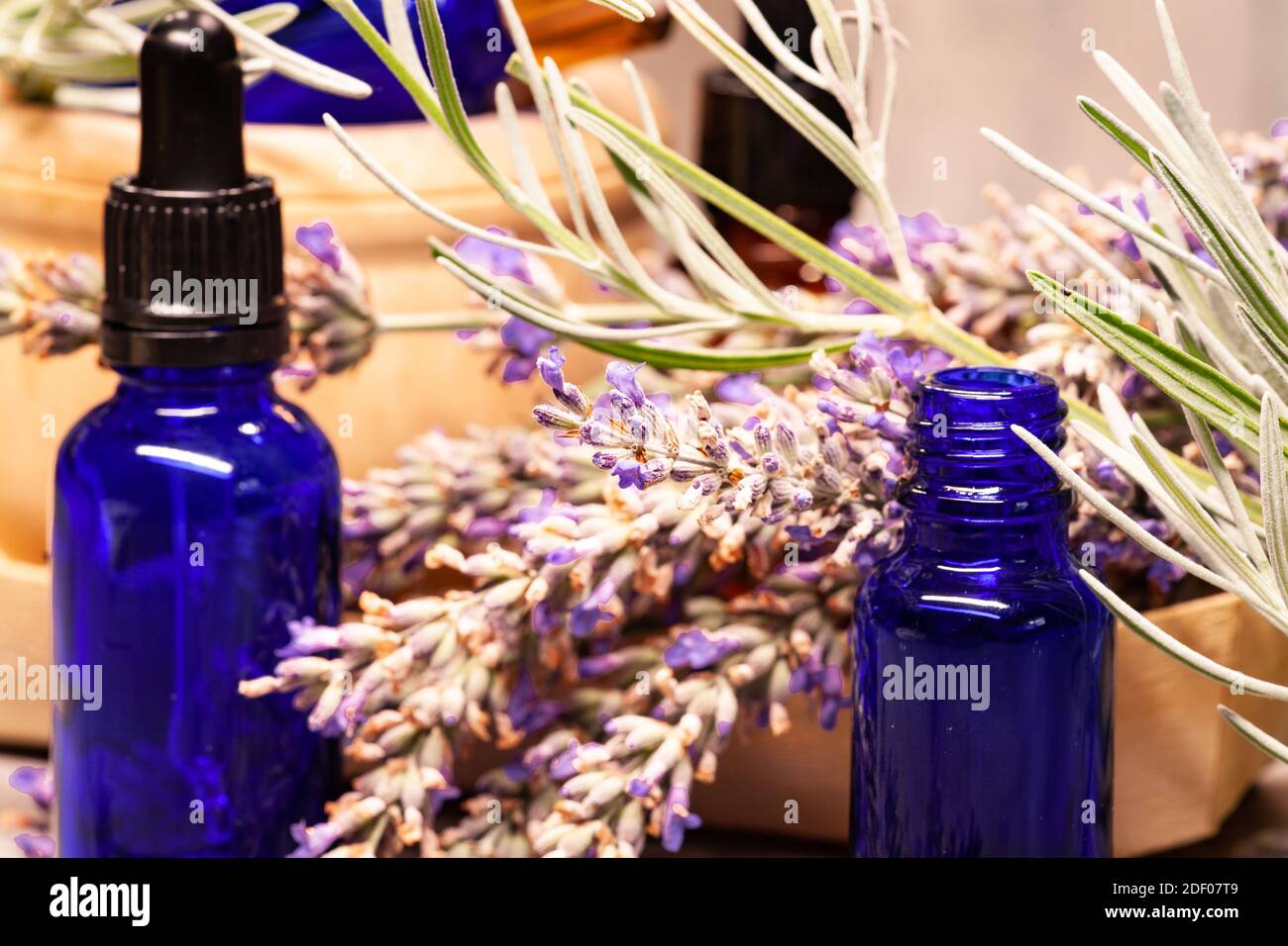 lavender mortar and pestle and bottles of essential oils for aromatherapy Stock Photo - Alamy
