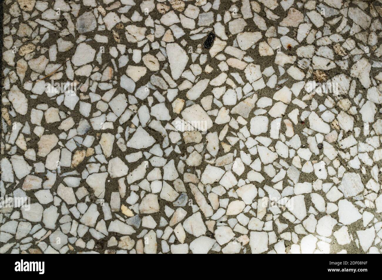 An overhead shot of the ground made up of white rocks Stock Photo - Alamy
