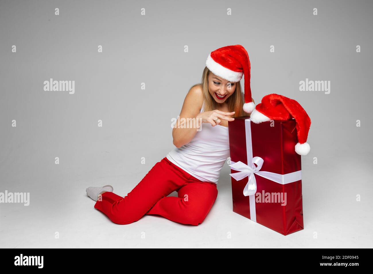 Christmas concept photo of jolly lady with huge gift box Stock Photo ...