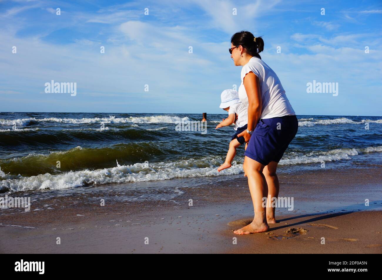 SARBINOWO, POLAND - Aug 06, 2018: People on sand at a beach in the ...