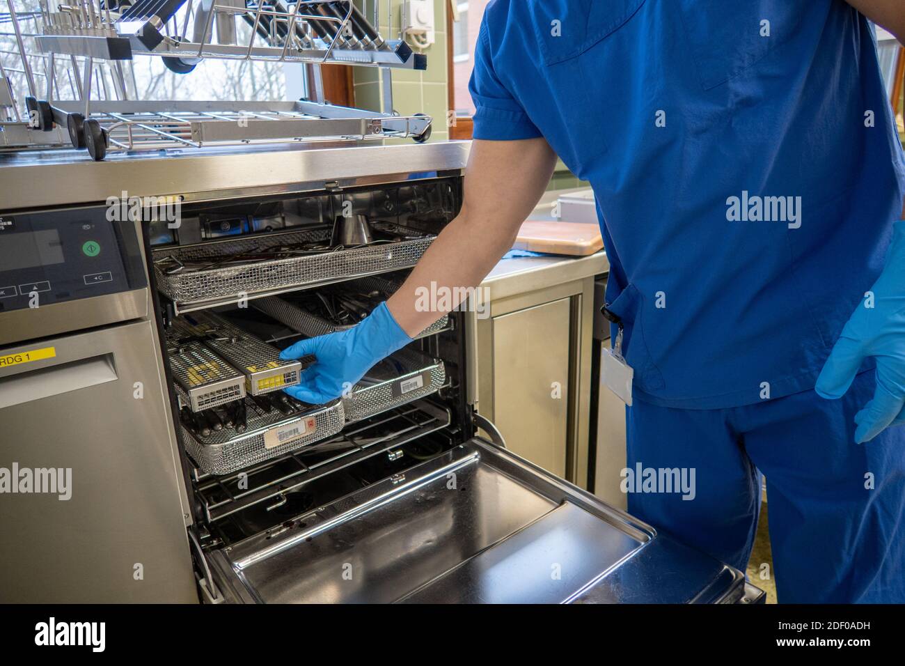 Washing surgical instruments hi-res stock photography and images - Alamy