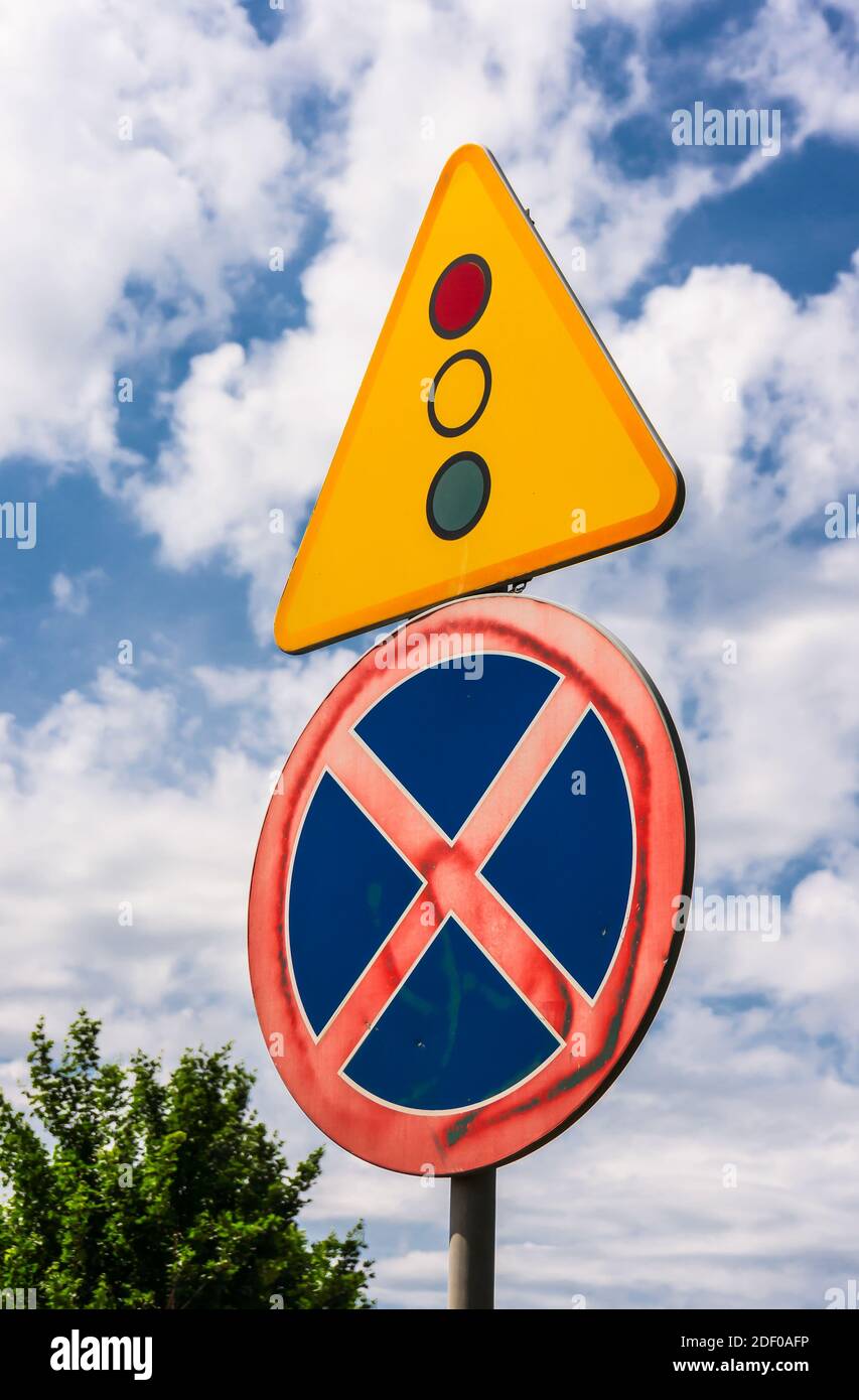 A vertical shot of a traffic signal sign and no stopping sign Stock ...