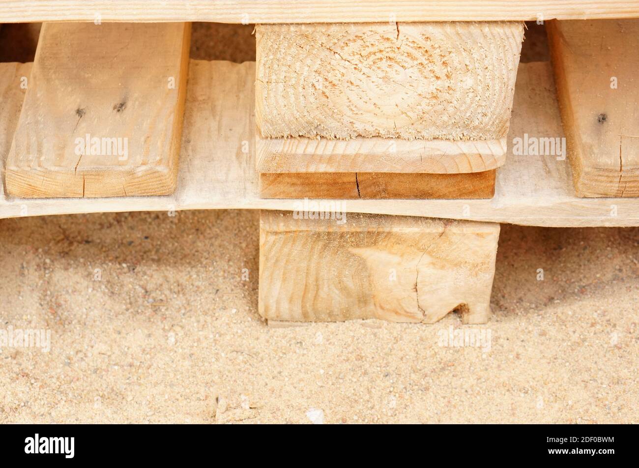 A closeup of a pallet on sand Stock Photo - Alamy