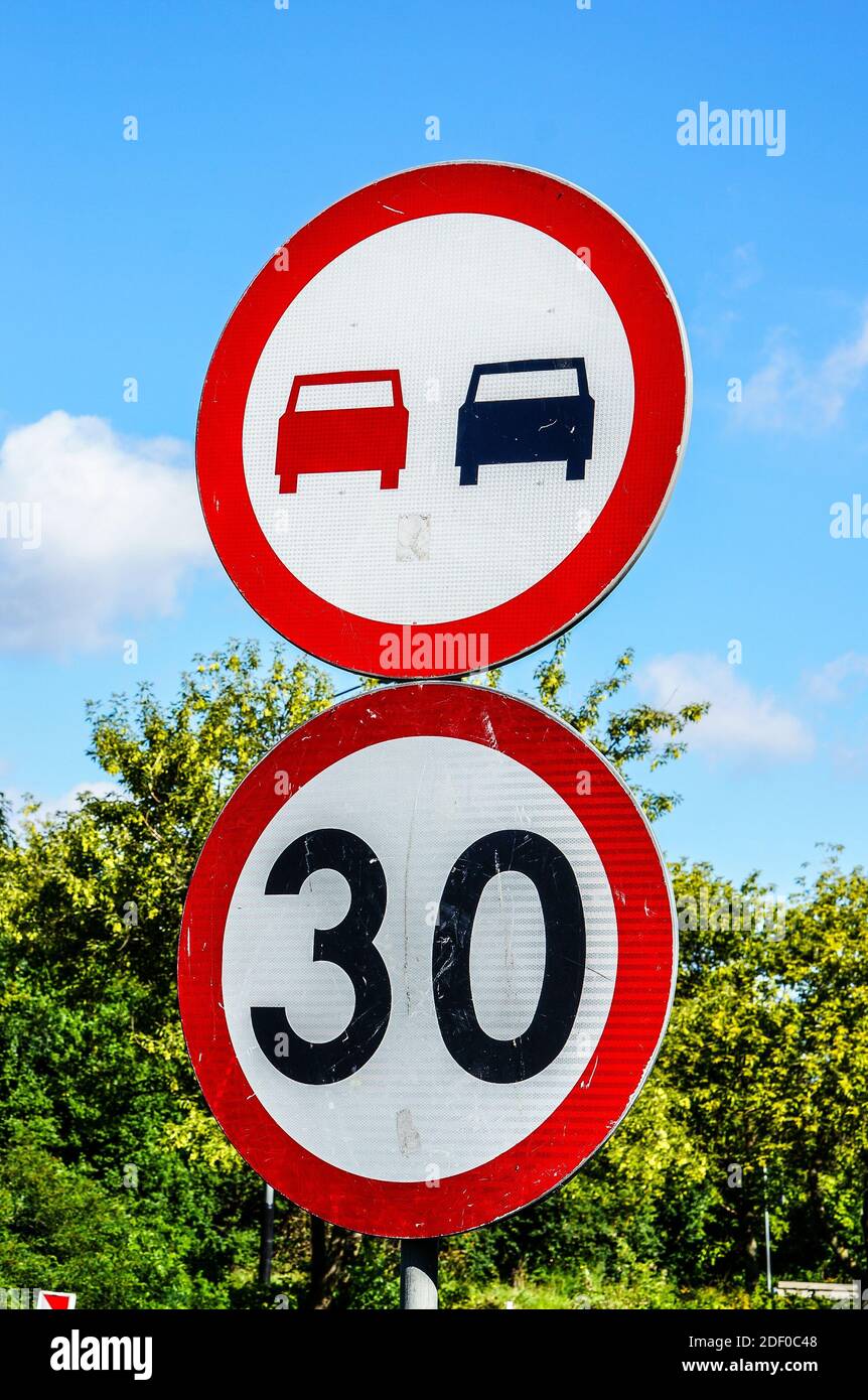 The traffic signs with trees and the blue sky in the background Stock ...