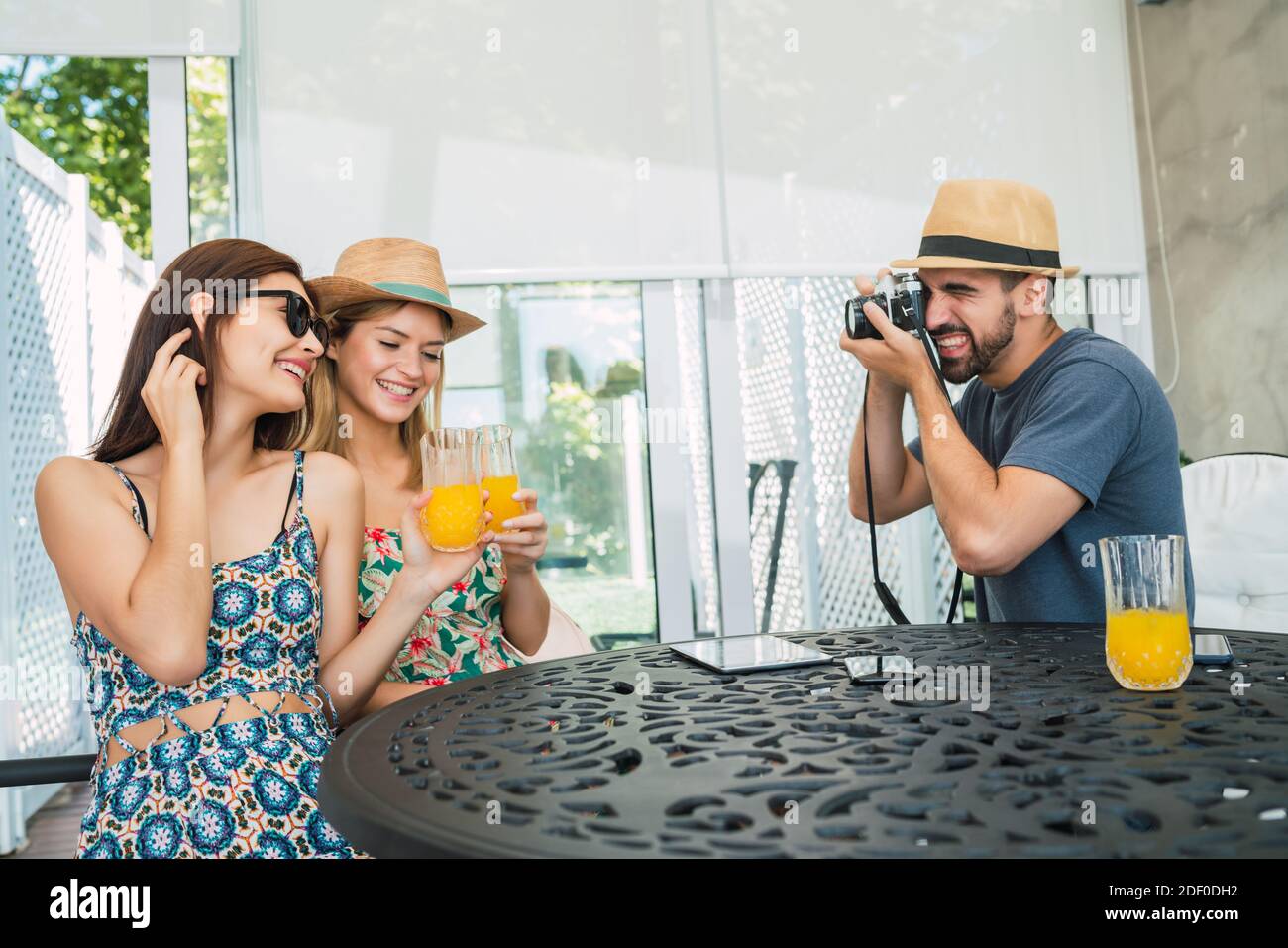Group three tourist friends planning hi-res stock photography and ...
