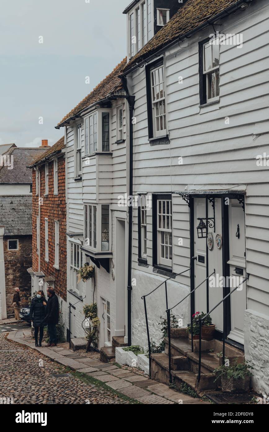 Rye, UK - October 10, 2020: Row of old stone and wooden terraced house ...