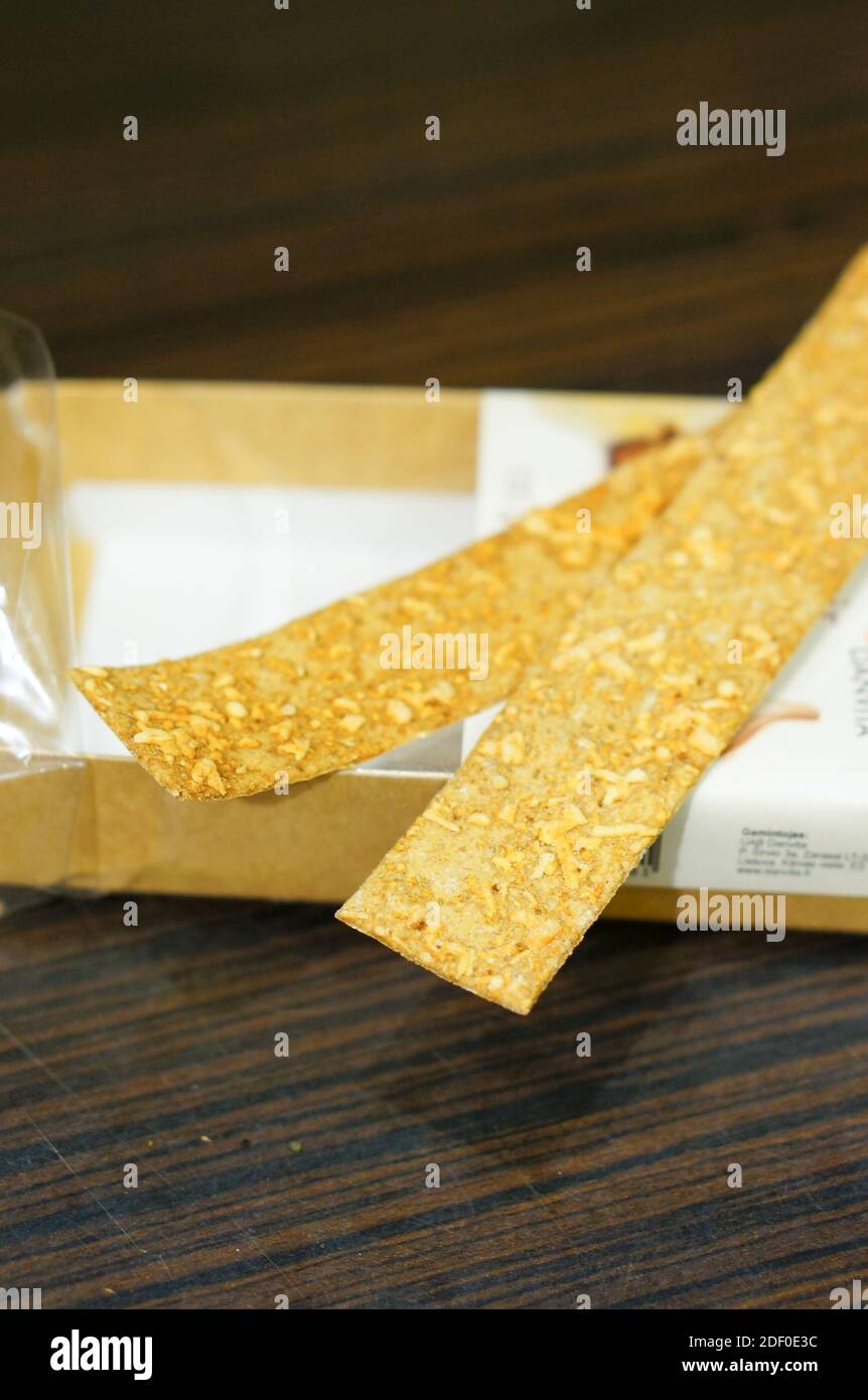A soft focus of long cheese crackers on a box packaging Stock Photo - Alamy