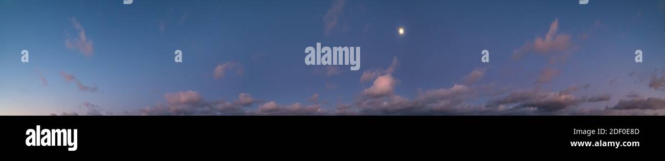 Clouds and full Moon in twilight sky view. Panoramic night sky ...