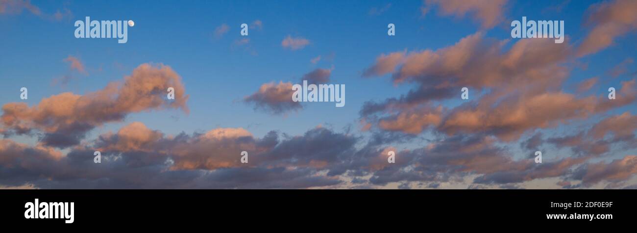 Clouds and full Moon in twilight sky view. Panoramic night sky ...