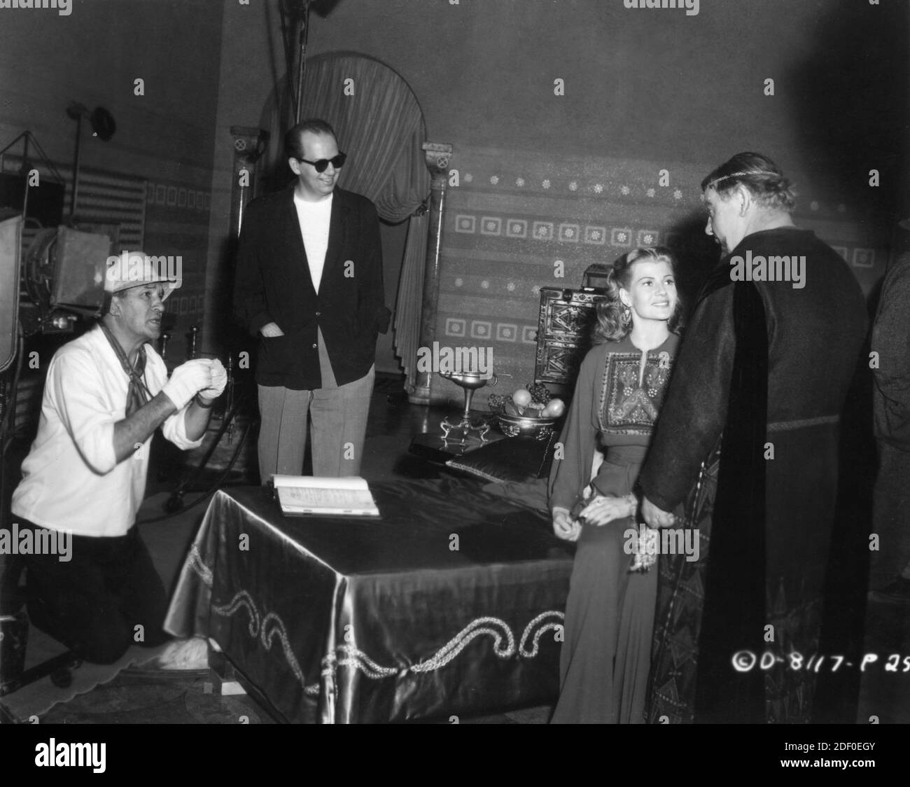 WILLIAM DIETERLE directing RITA HAYWORTH and CHARLES LAUGHTON on set ...