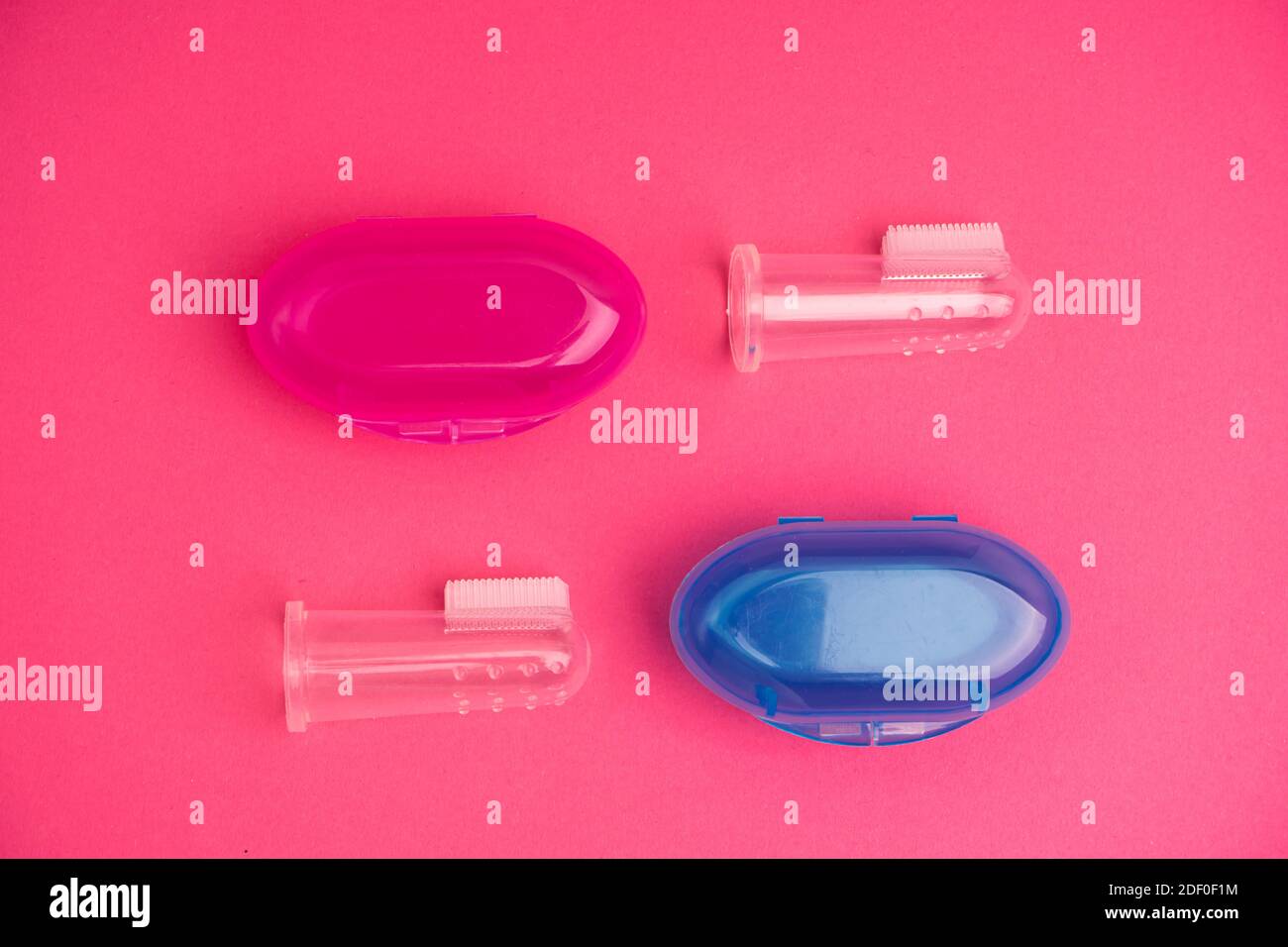 Compact toothbrush fingertip. Travel hygiene Stock Photo - Alamy