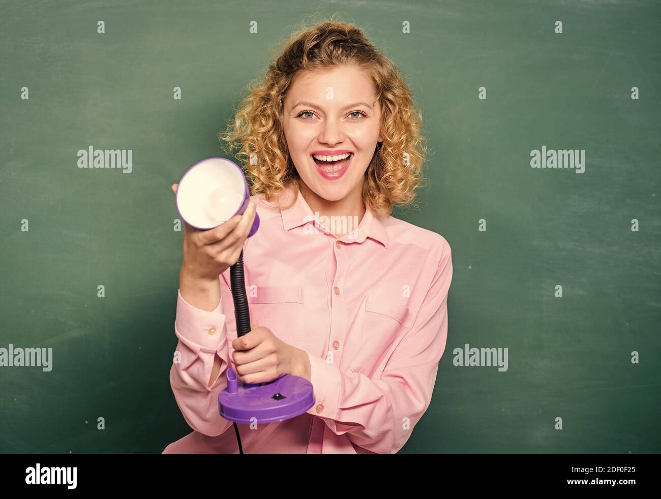 happy shining. student girl working with electricity. teacher with lamp ...