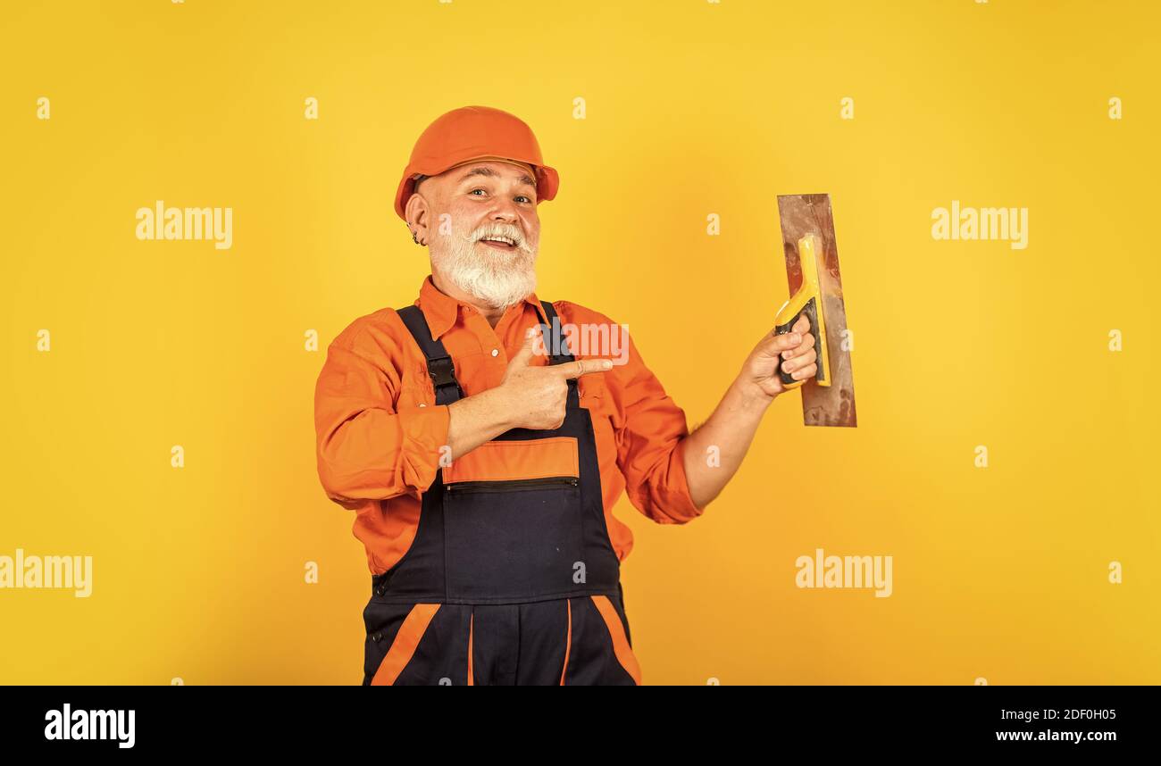 Applying Putty Plaster High Resolution Stock Photography and Images - Alamy