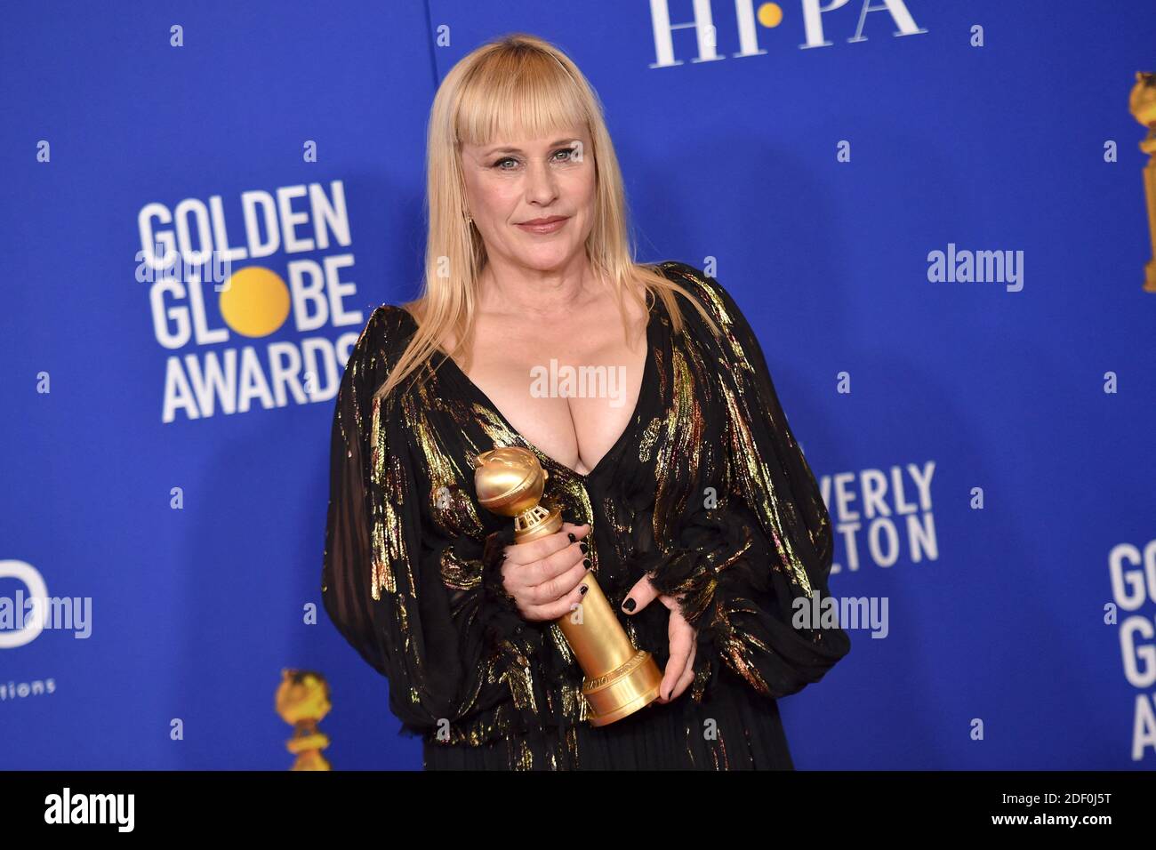 Patricia Arquette poses in the press room of the 77th Annual Golden ...