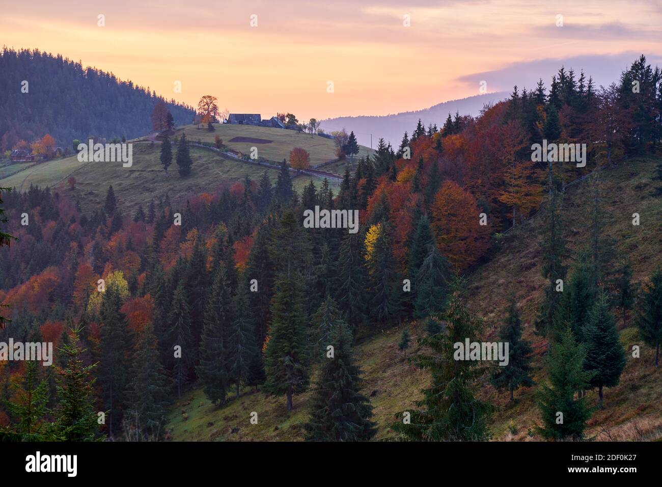 Landscape with a sunrise in a cold November morning in the mountains ...