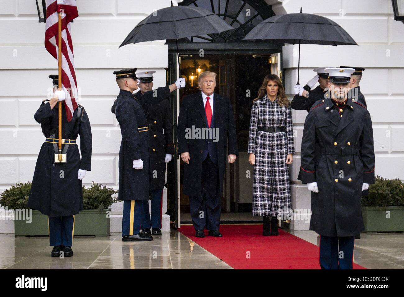 President Donald Trump and First Lady Melania Trump wait to greet Greek ...