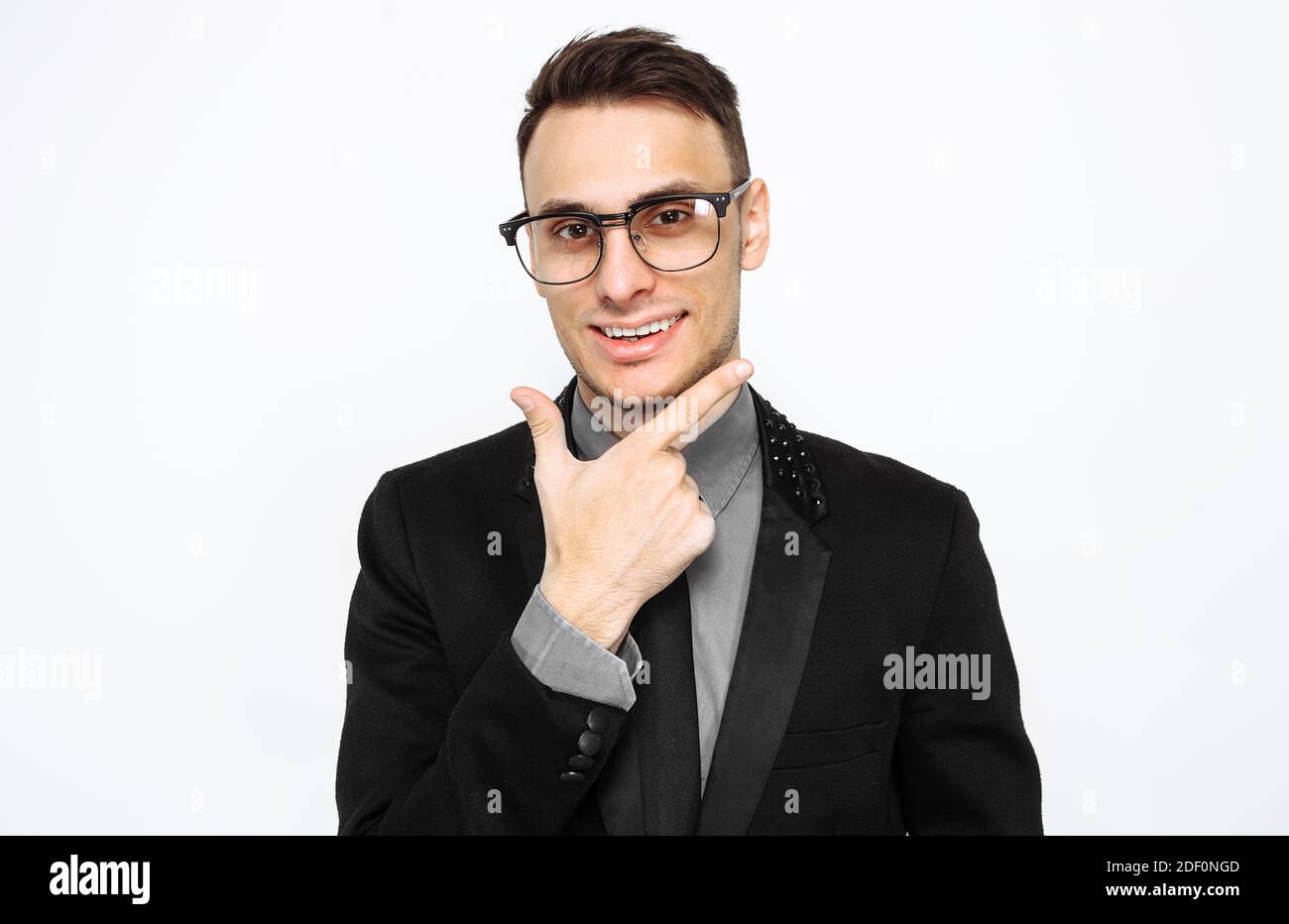 Portrait of an authoritative male man in glasses and suit, confident ...