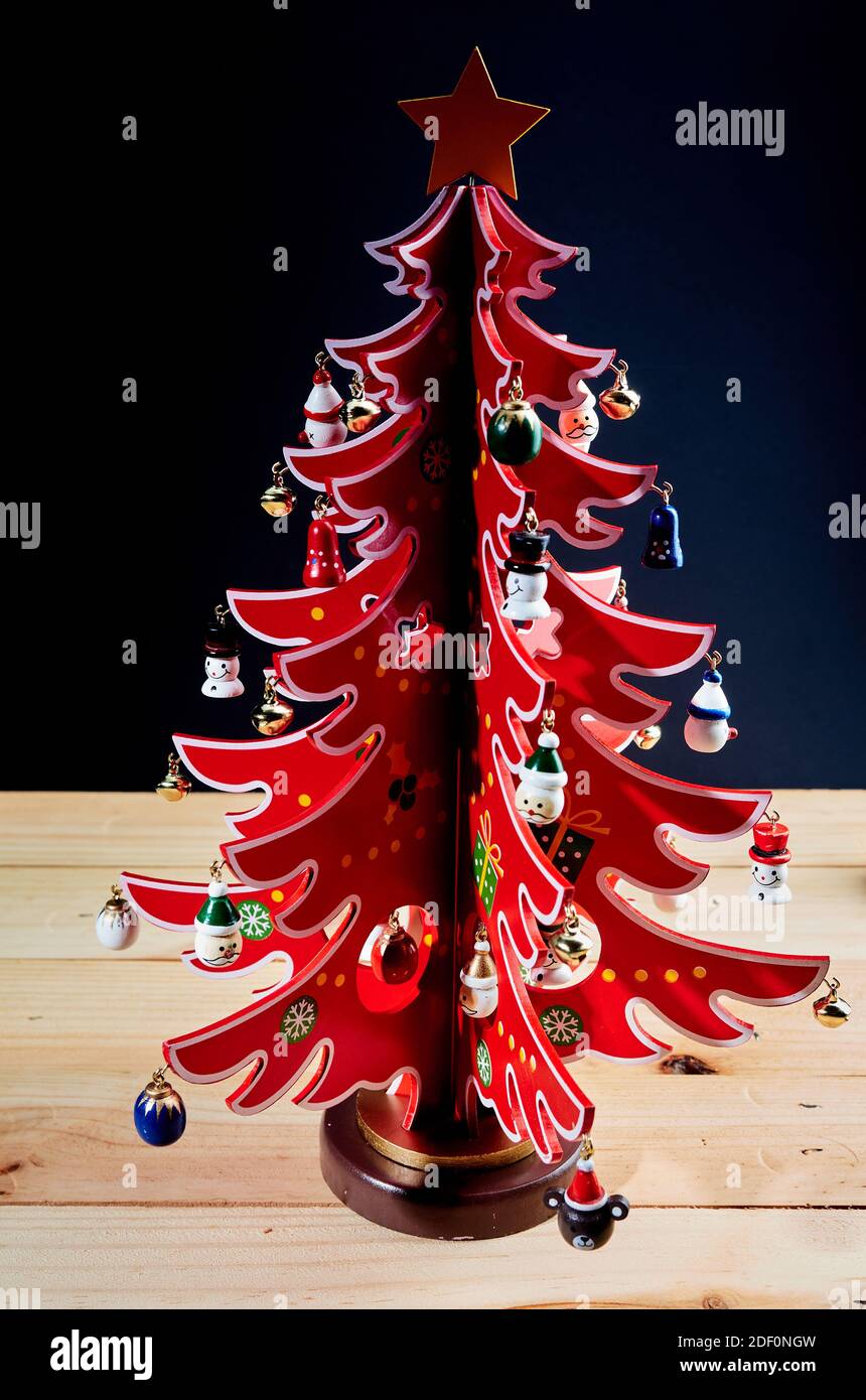 Christmas decoration for the holidays, spruce painted red with small ...