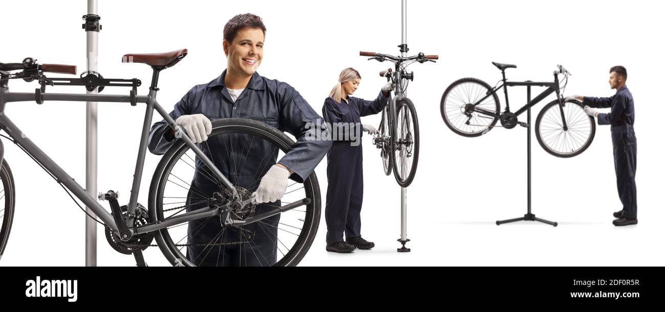 Bicycle repair shop with workers fixing bikes isolated on white ...