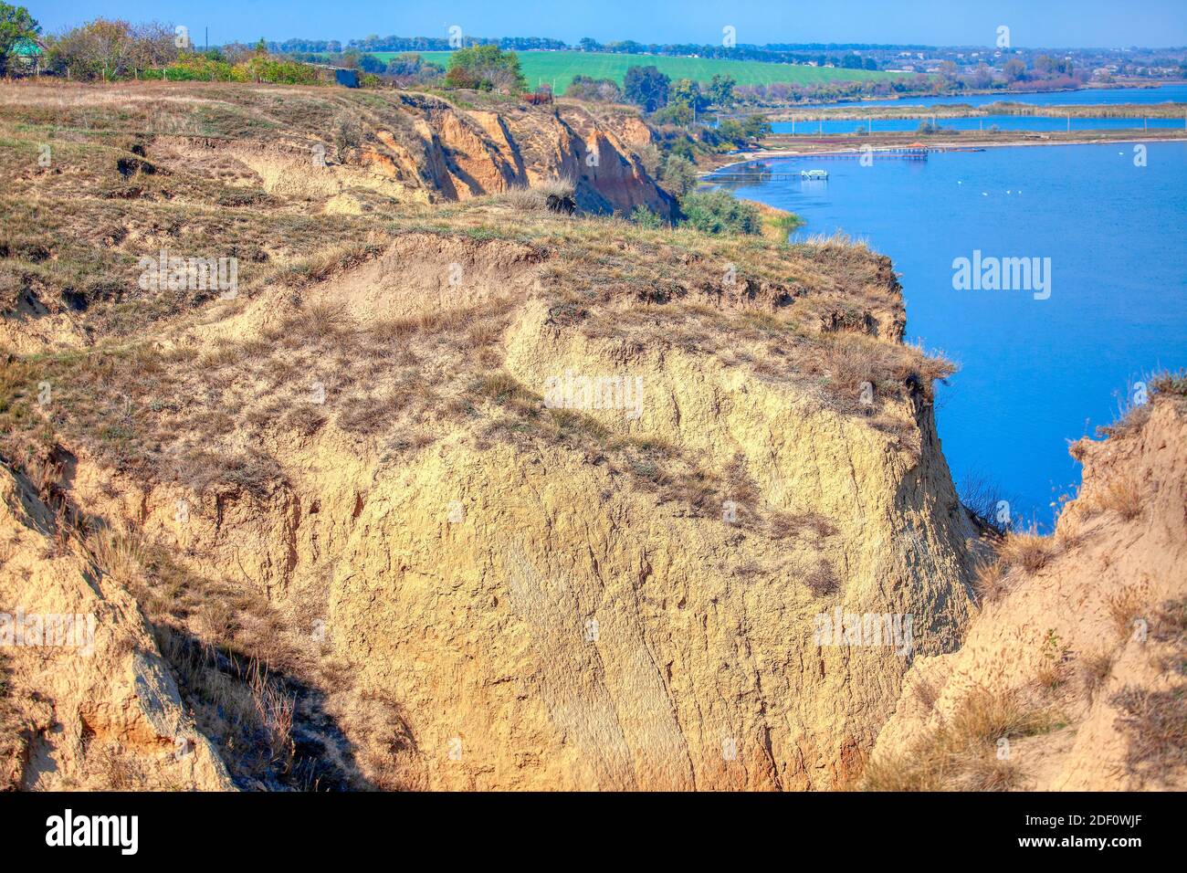 Clay coastal cliff scenery . Budaki Lagoon coastline Stock Photo - Alamy