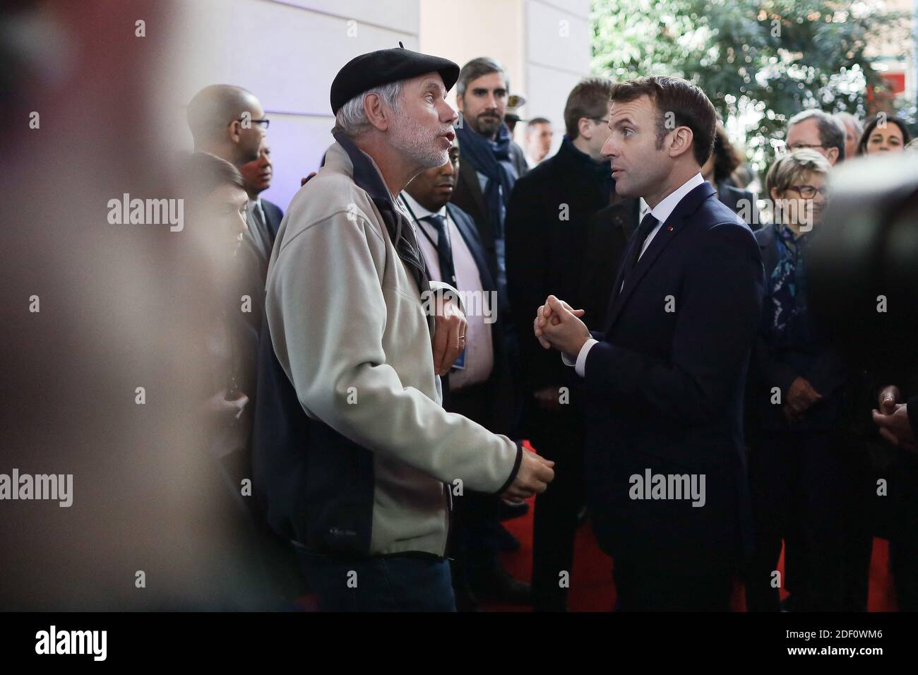 French mathematics teacher Pierre Coste shakes hands with French ...