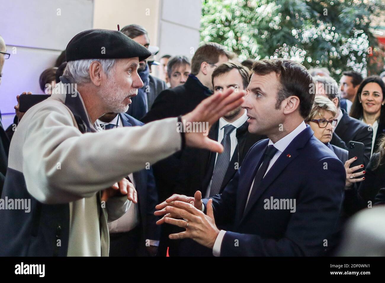 French mathematics teacher Pierre Coste shakes hands with French ...
