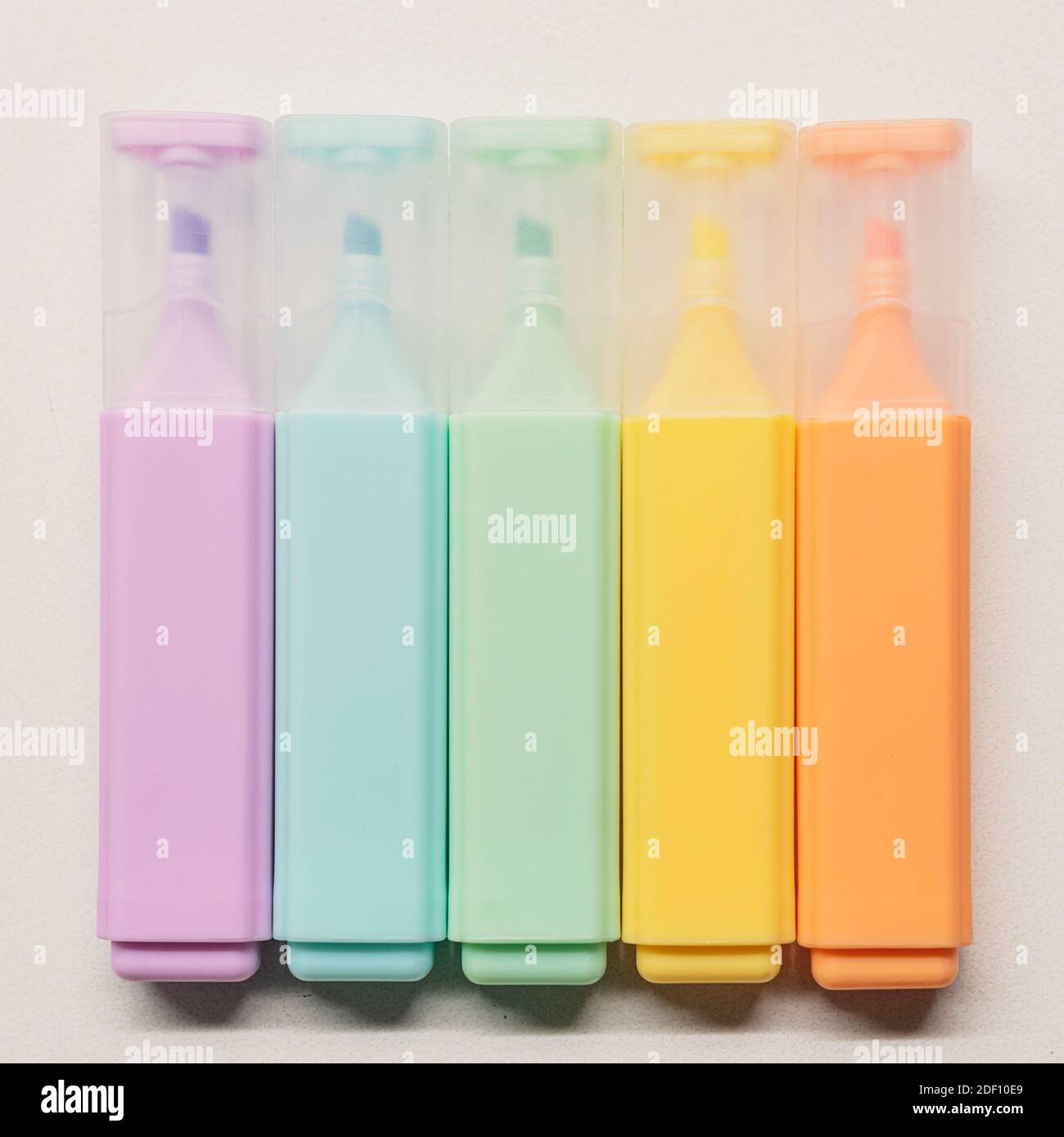 Five lined pastel colored marker pens Stock Photo - Alamy