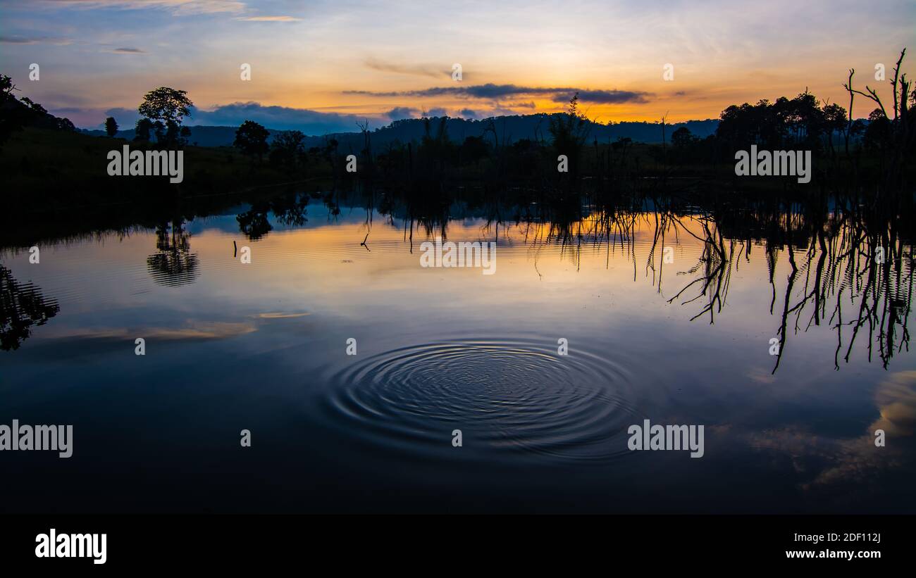 sunset and Water reflection Stock Photo - Alamy