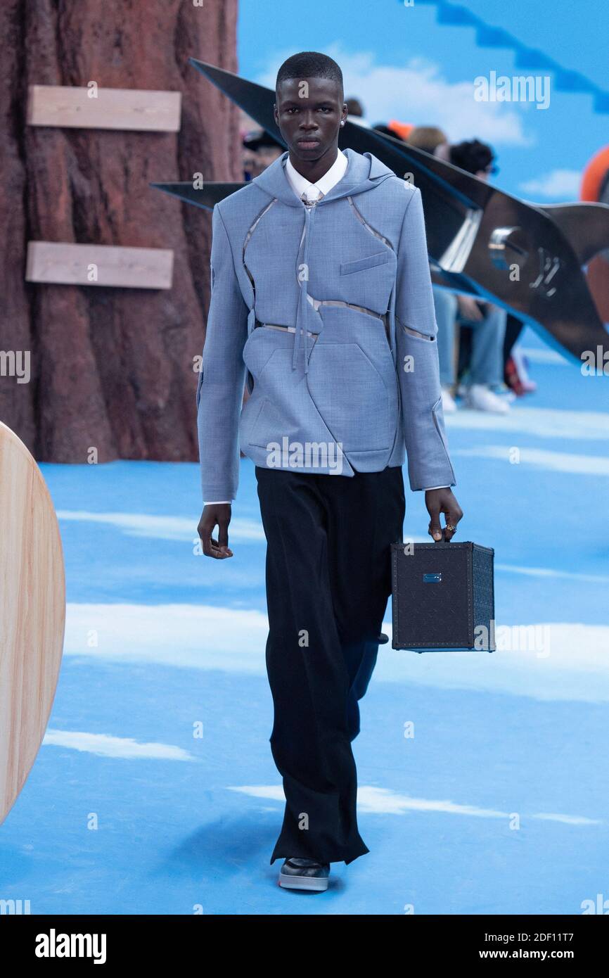 A model walks the runway during the Louis Vuitton Menswear Fall/Winter ...