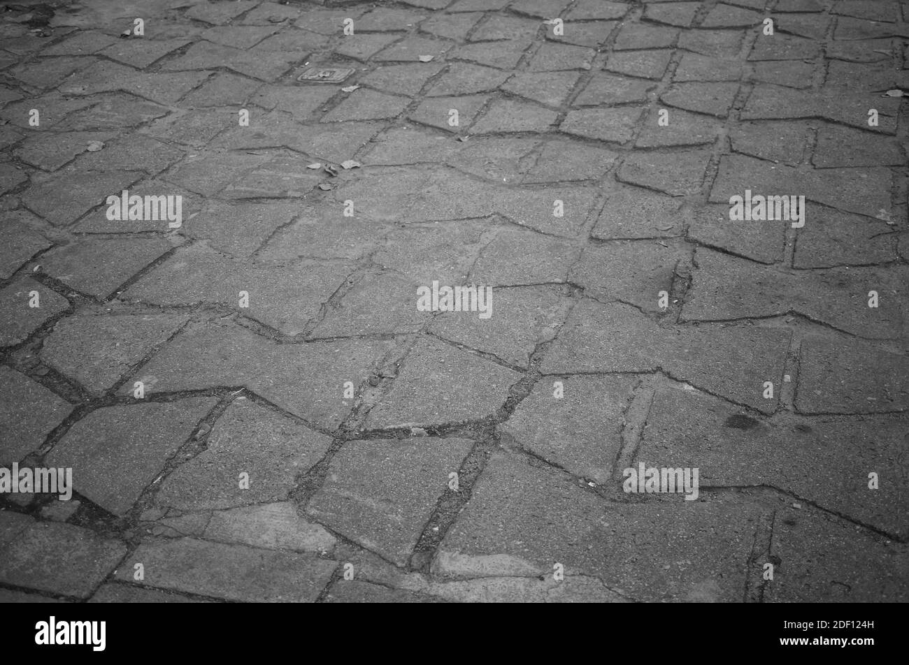 A top view of a trapezoid concrete brick path Stock Photo - Alamy