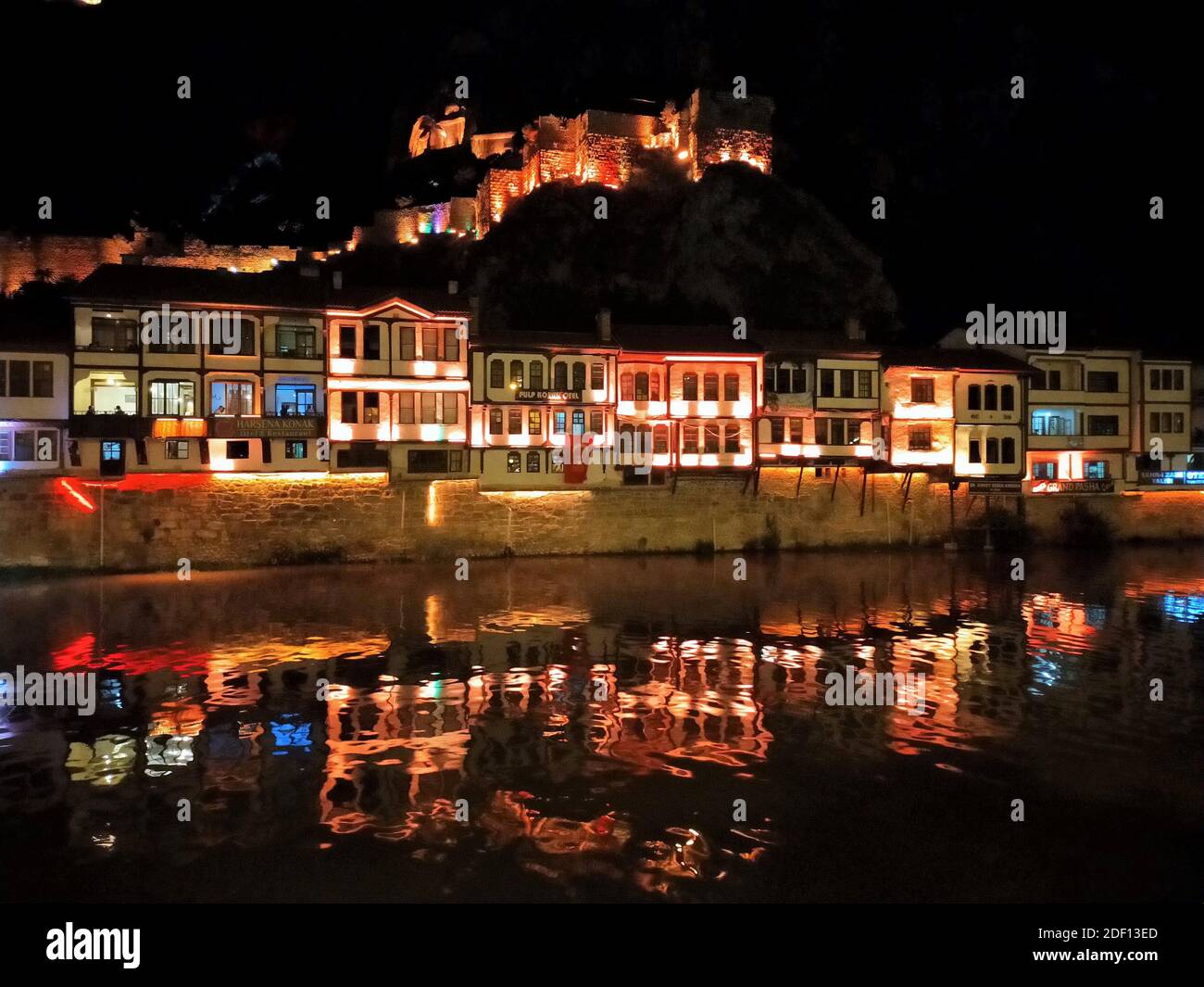 Traditional Amasya houses by Kizilirmak River at night. Historical ...
