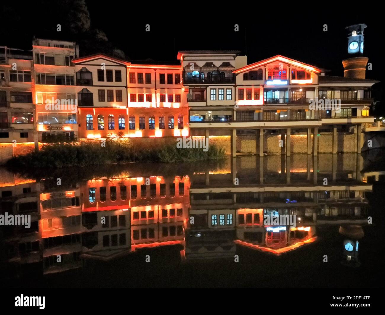 Traditional Amasya houses by Kizilirmak River at night. Historical ...