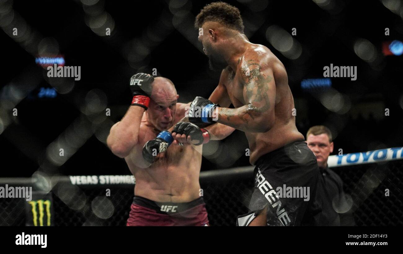 Aleksei Oleinik (red gloves) vs. Maurice Greene (blue gloves) at T ...