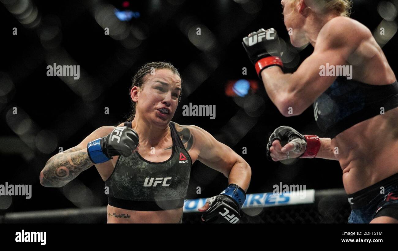 Holly Holm (red gloves) vs. Raquel Pennington (blue gloves) at T Mobile ...