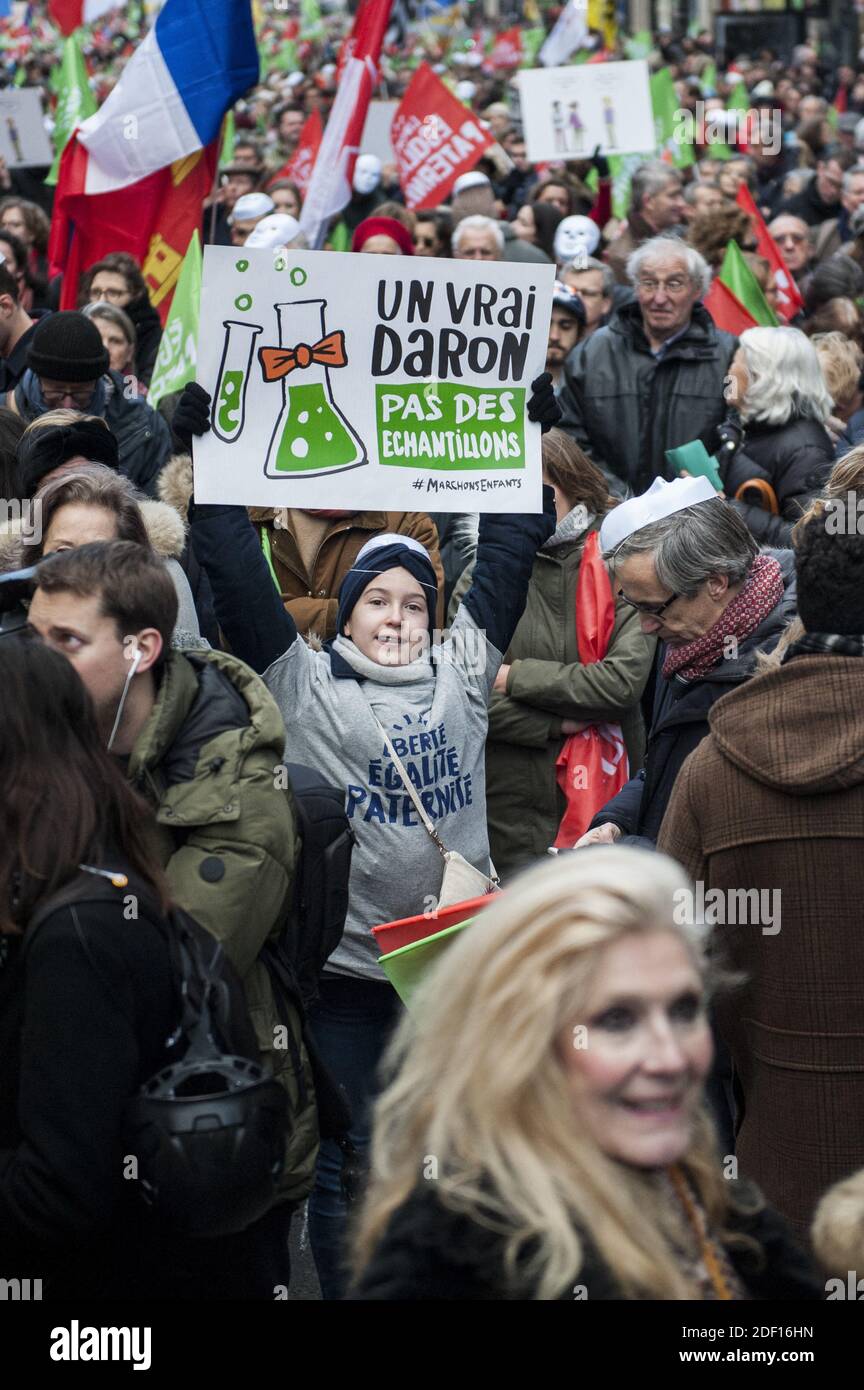 Protesters wave flags and hold placards during a demonstration called ...