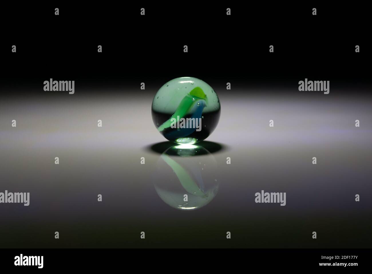 glass marble and its reflection Stock Photo - Alamy