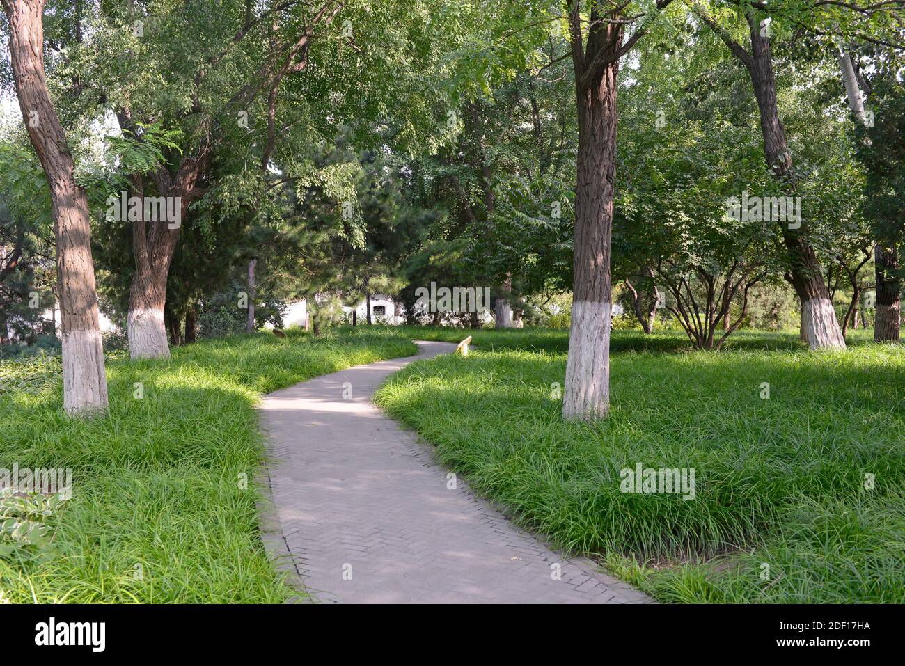 Path in a public park in southwestern central Beijing, China, a ...