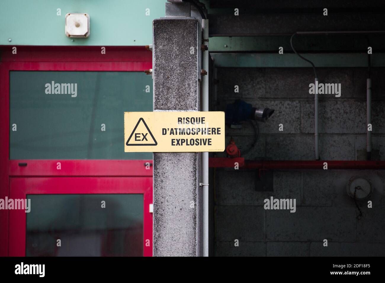 Illustrations of the laboratory of AstraZeneca with a sign Risque d ...