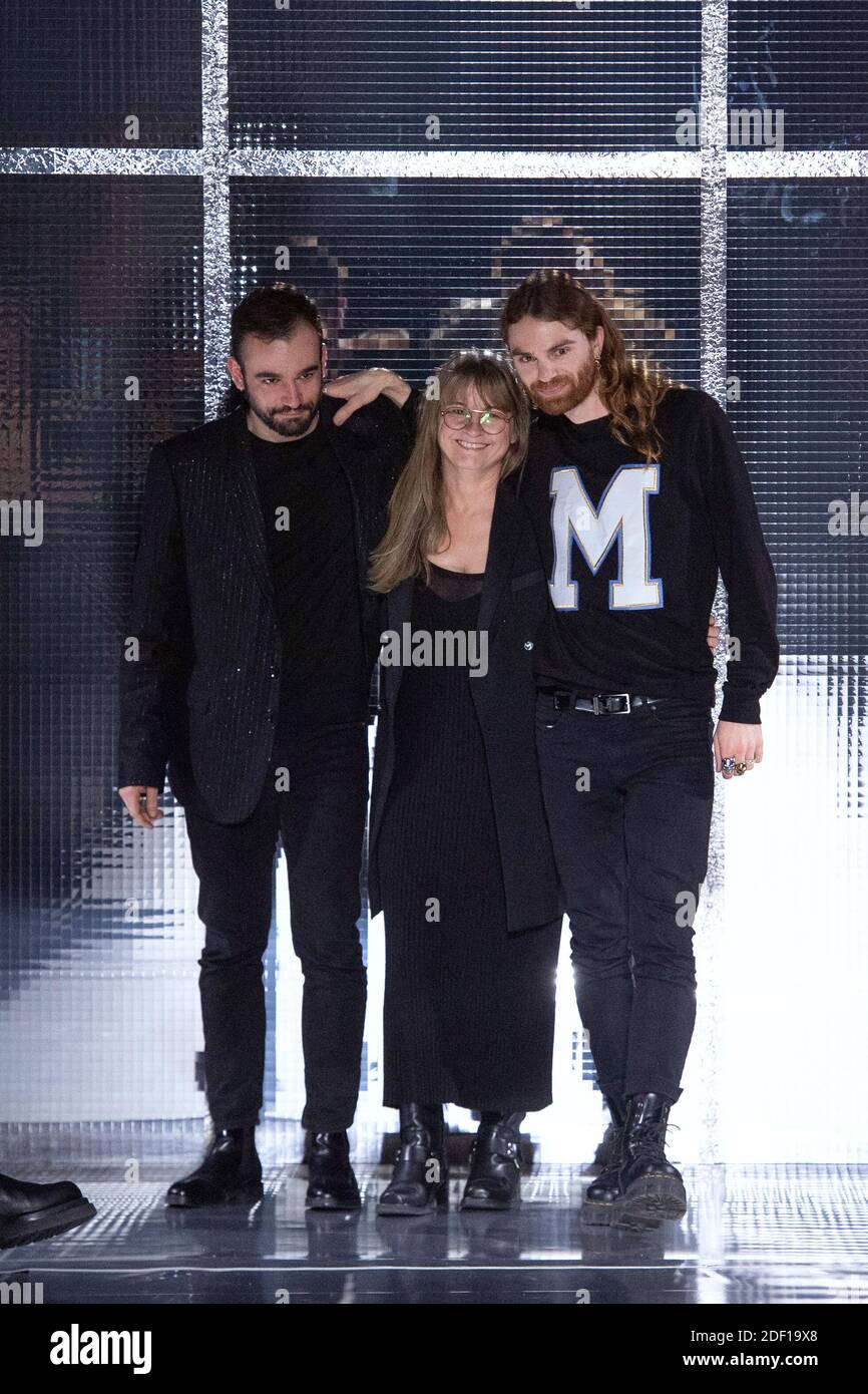 Designers make an appearance on the runway during the Azzaro Haute ...