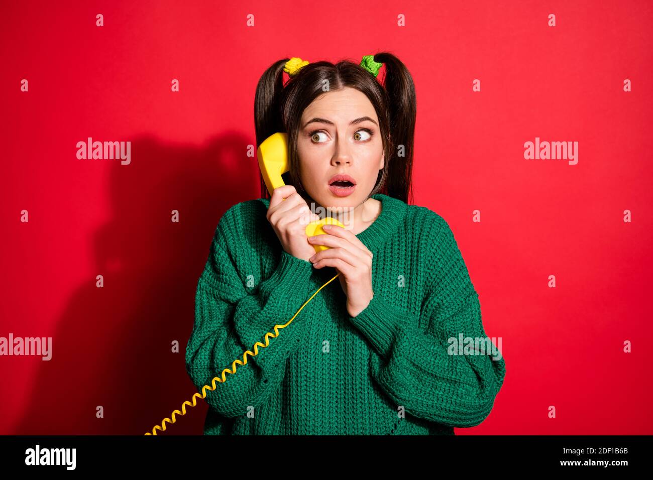Photo of young scared worried shocked girl talk telephone look ...