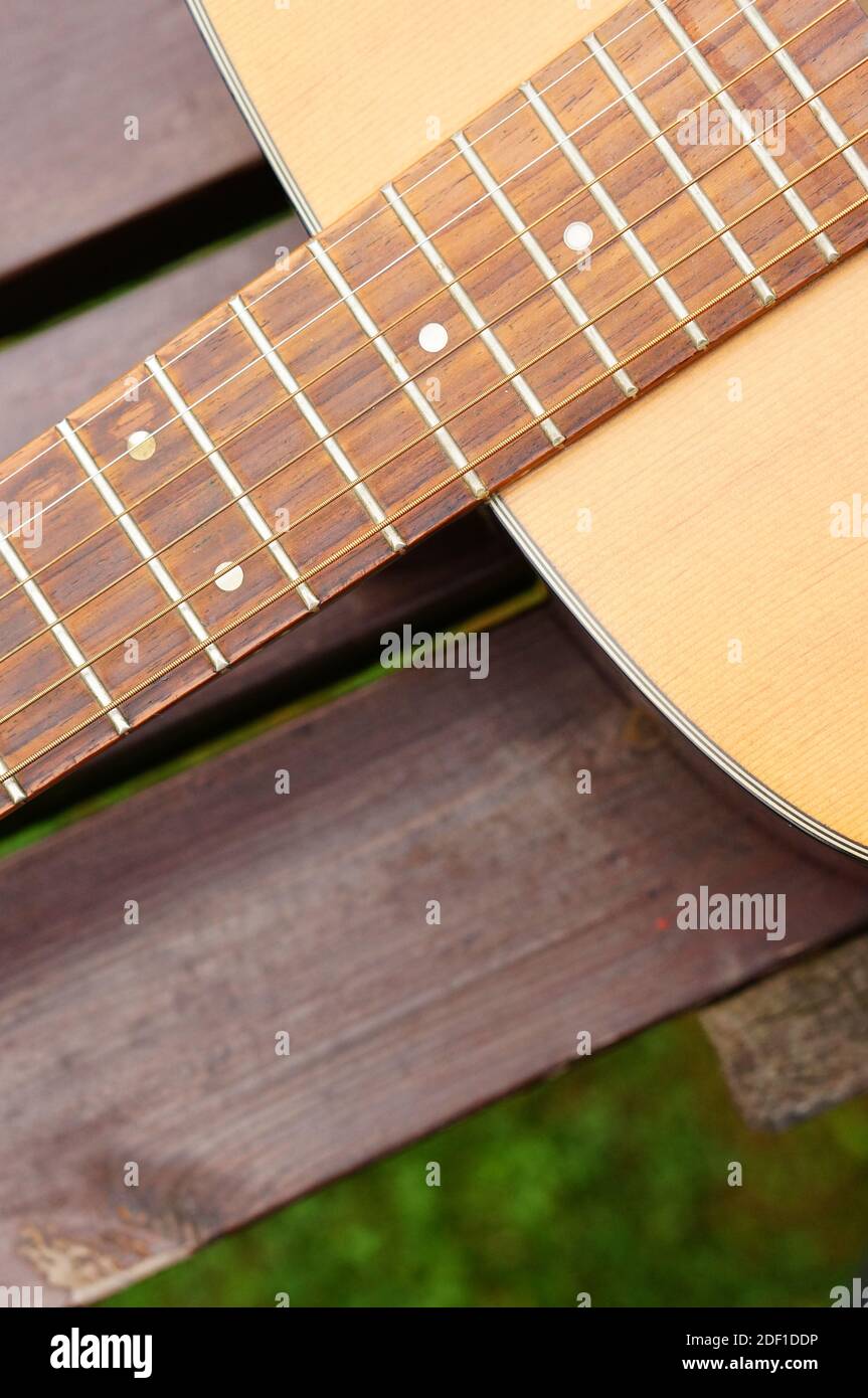 A top view of the neck of an acoustic guitar Stock Photo - Alamy