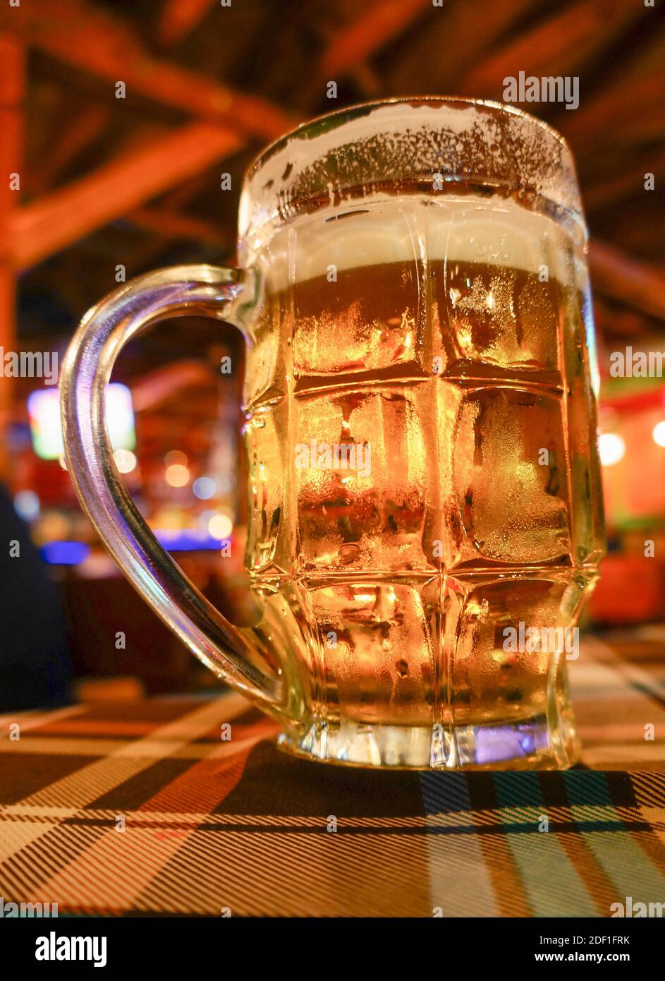 A closeup of a glass of beer with foam Stock Photo - Alamy